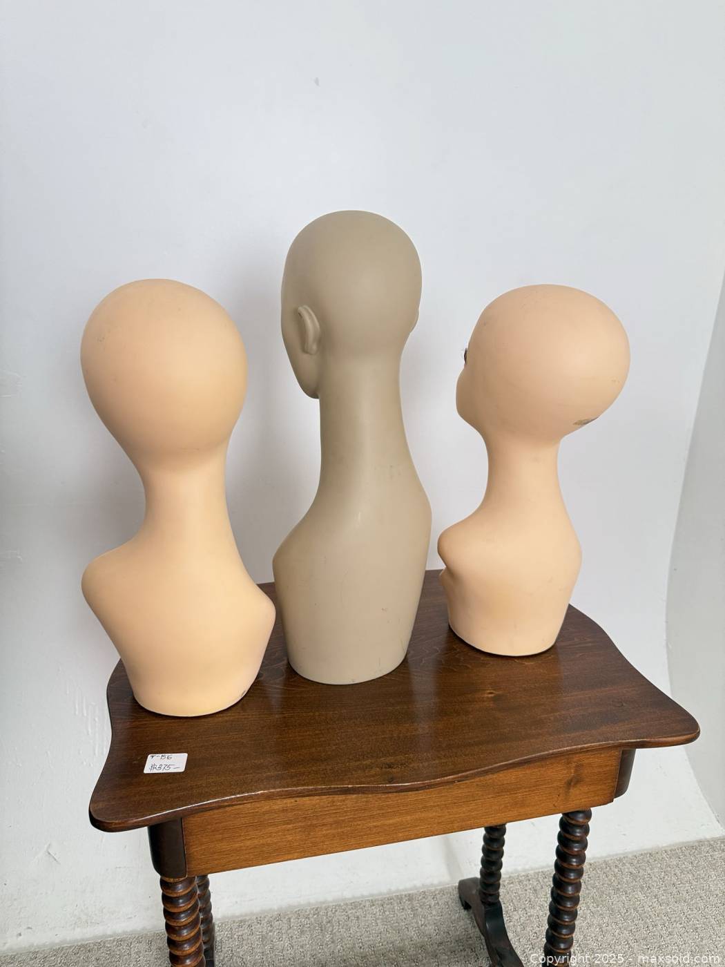 Three vintage mannequin display heads | Maxsold