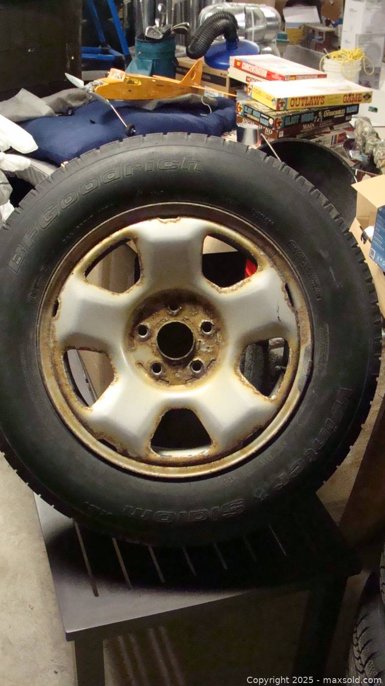 BF Goodrich Winter Slalom tires on 17in steel rims | Maxsold