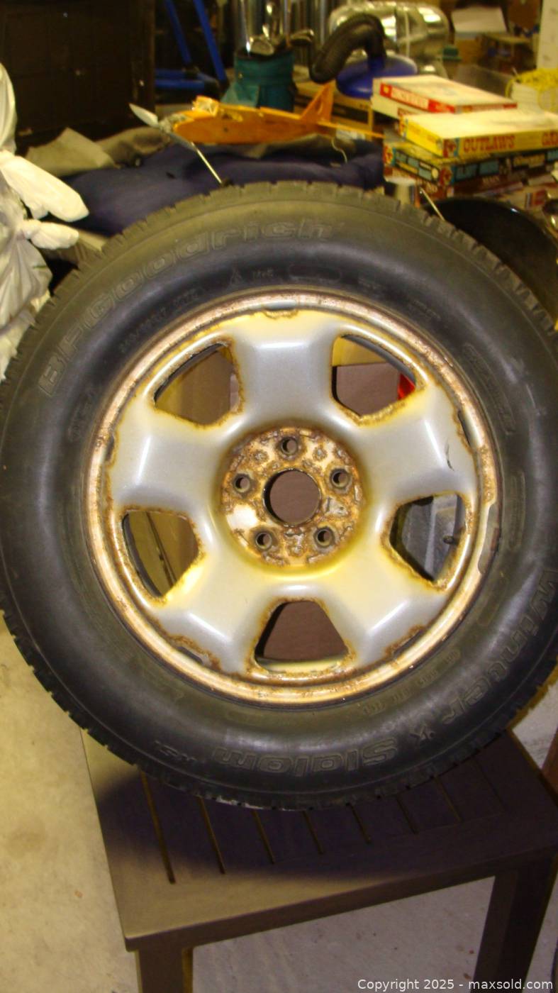 BF Goodrich Winter Slalom tires on 17in steel rims | Maxsold