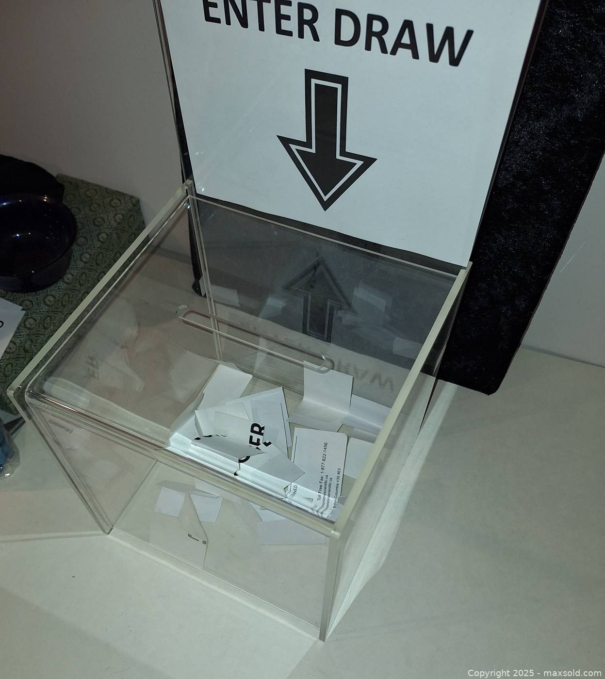 Ballot box with key tags and golf tees | Maxsold