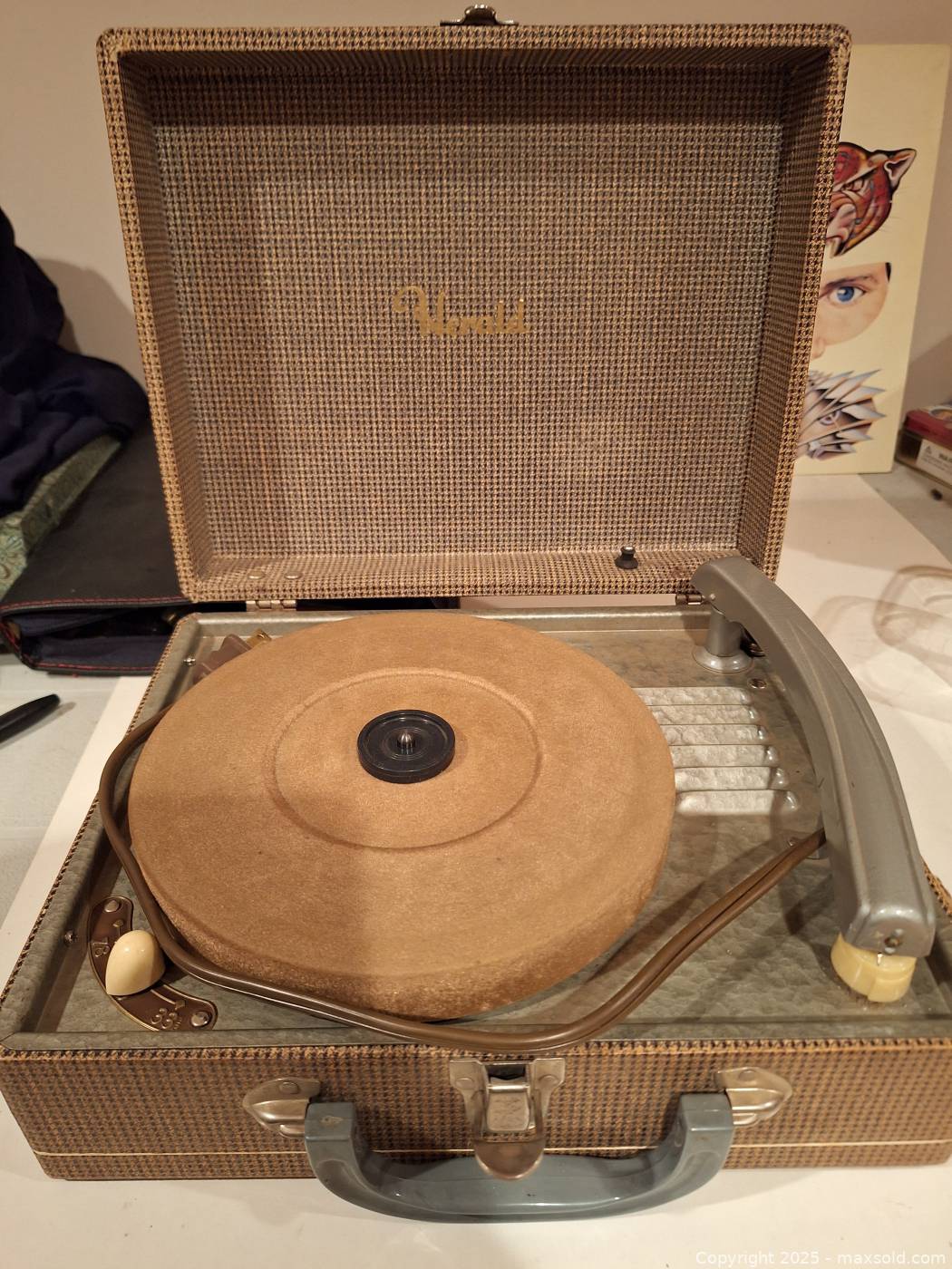 Herald record player with 59 records | Maxsold