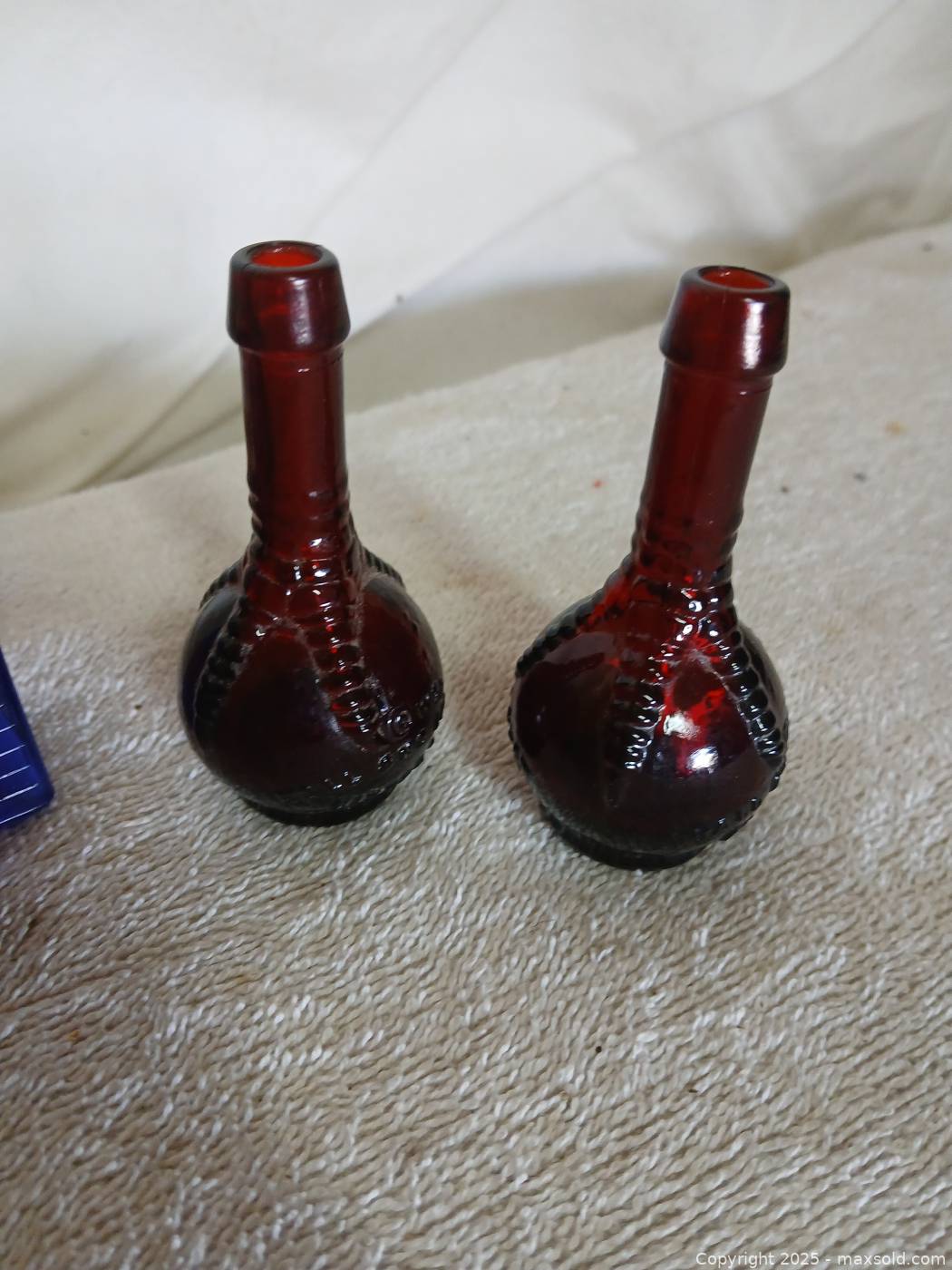 Assorted collector glass bottles, 9 pcs | Maxsold