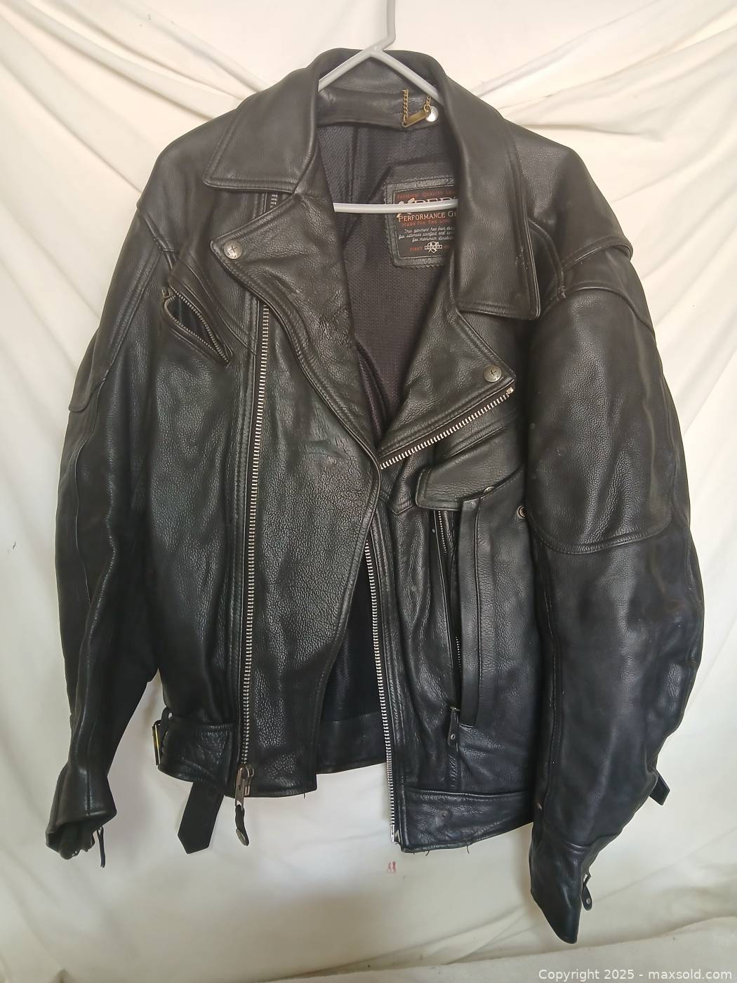 Xpert Performance Gear leather jacket | Maxsold