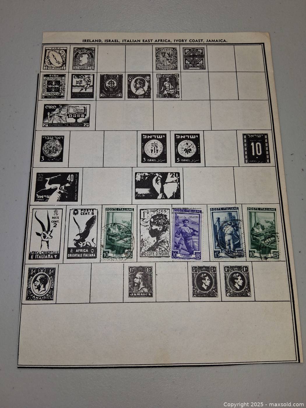 Approximately 50 World Postage Stamps 1900s–1980s on Album Pages | Maxsold