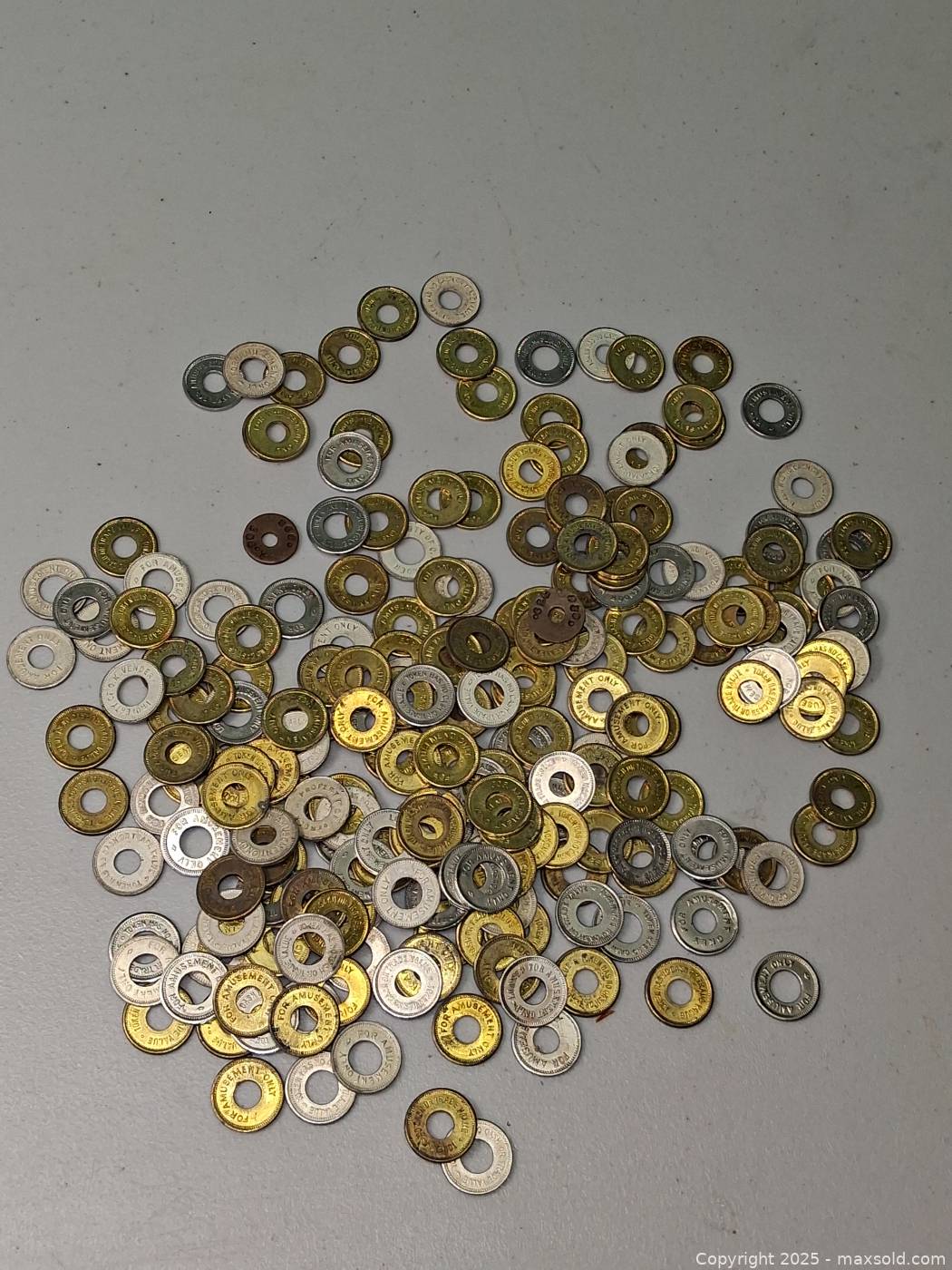Amusement gaming holed brass tokens ~160 | Maxsold