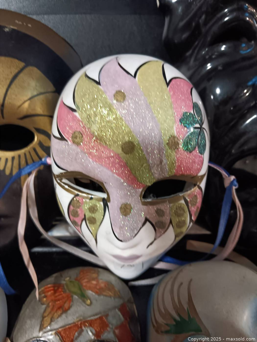 Ten decorative ceramic masks | Maxsold