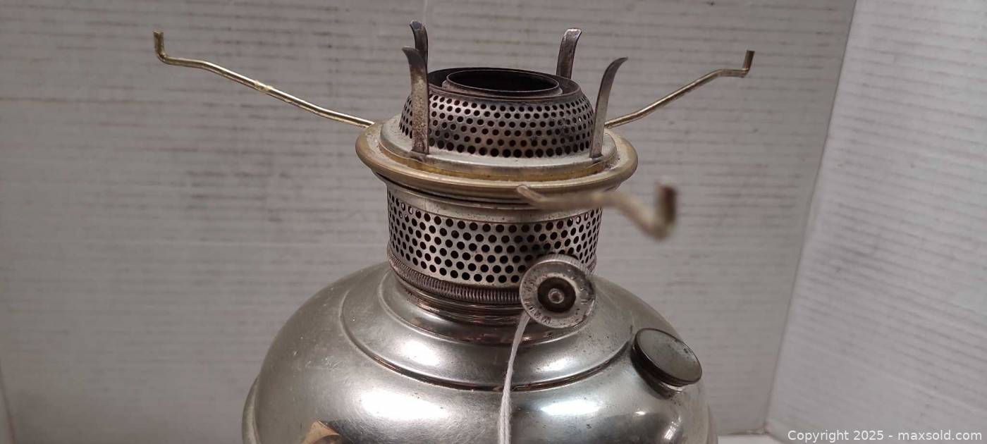 Vintage metal oil lamp burner with green glass top | Maxsold