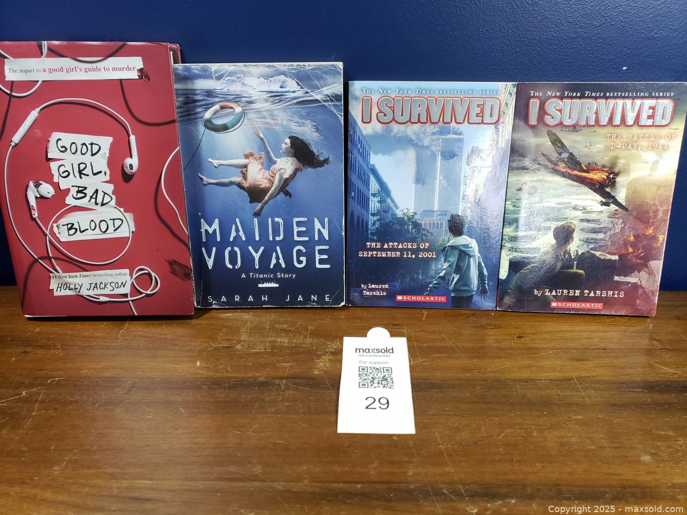 4 English trade paperback books | Maxsold