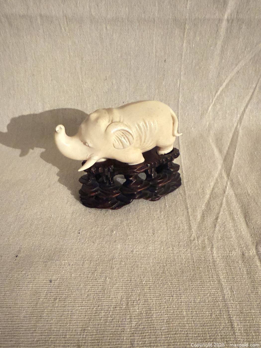 Chinese bone carved elephant figurine & stand | Maxsold