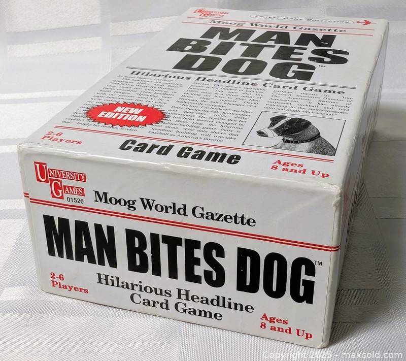 Man Bites Dog headline card game | Maxsold
