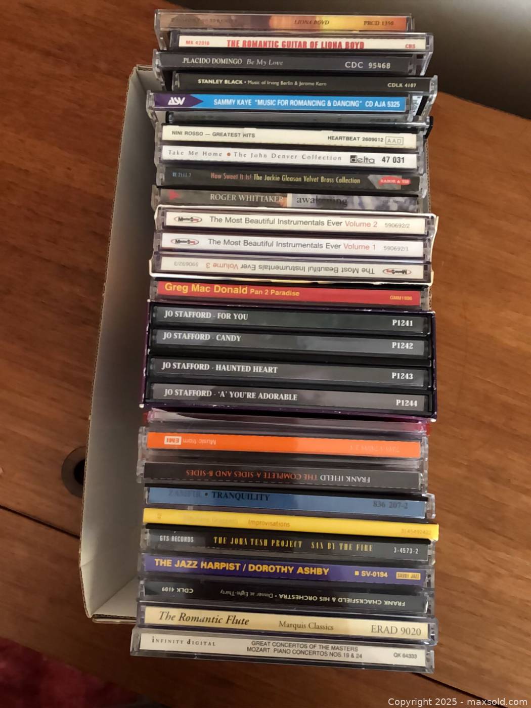 Audio CD collection with carriers and cases | Maxsold