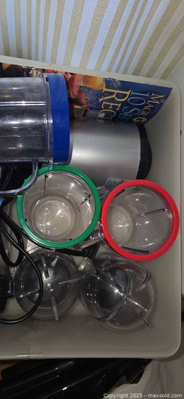 Magic Bullet blender with cups, lids, blades, guide | Maxsold