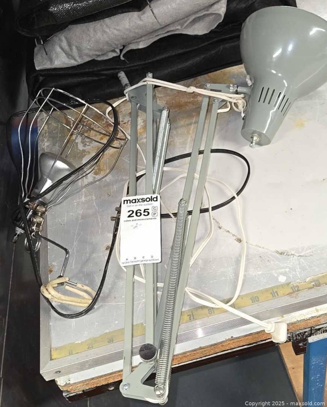 Adjustable swing-arm lamp and clamp-on shop light | Maxsold