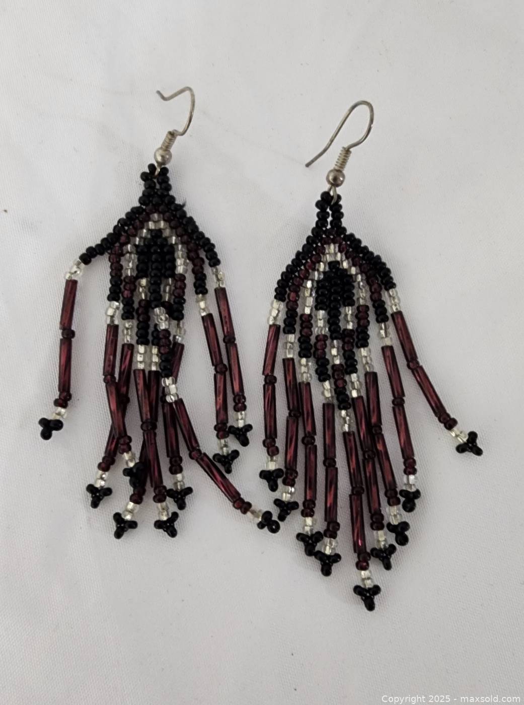 Beaded cuff strap and 5 pairs earrings | Maxsold