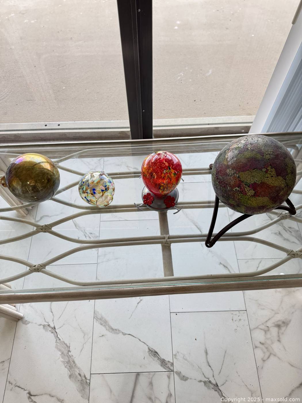 4 hand-blown glass orbs with iron stand | Maxsold