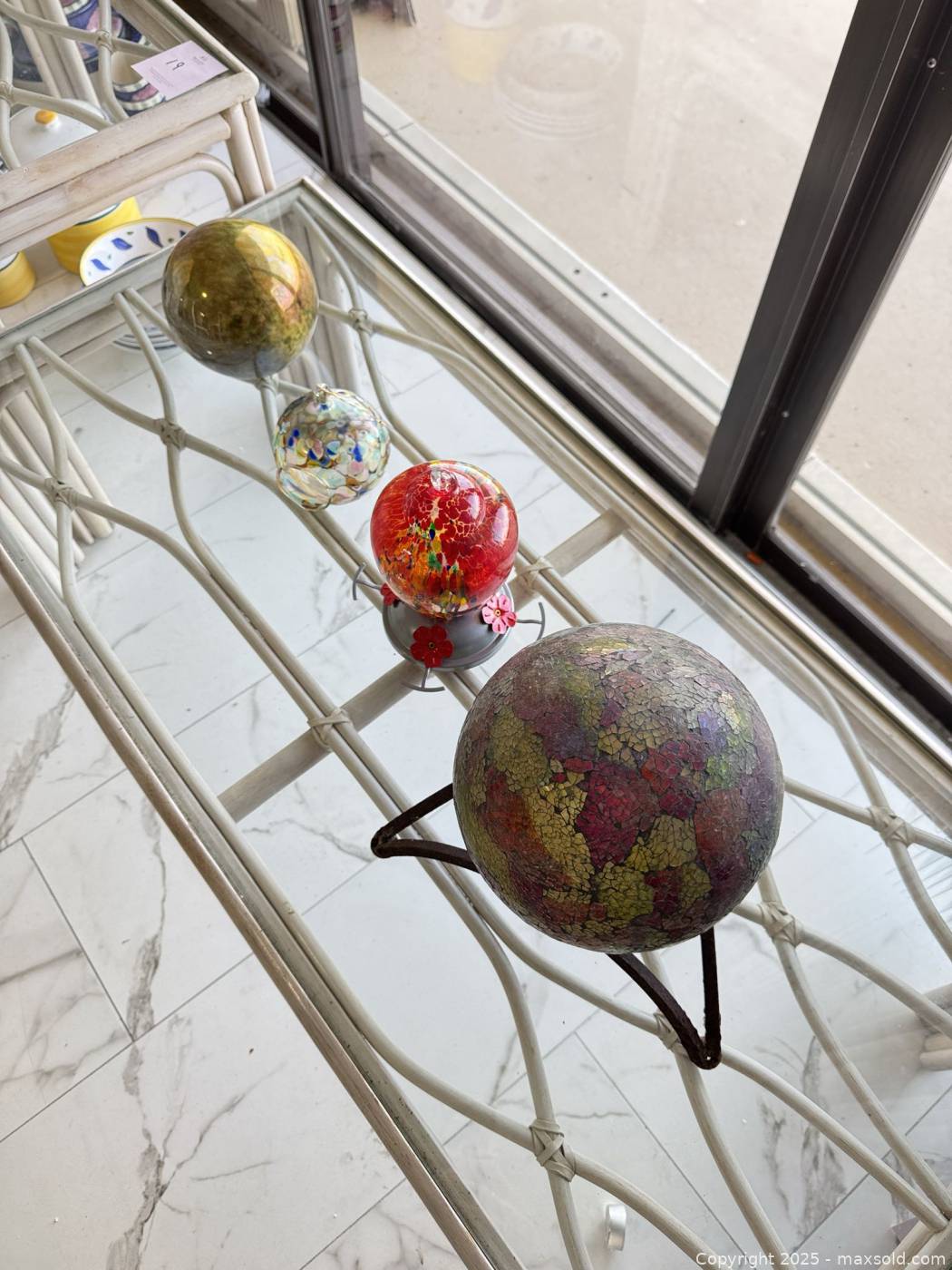 4 hand-blown glass orbs with iron stand | Maxsold