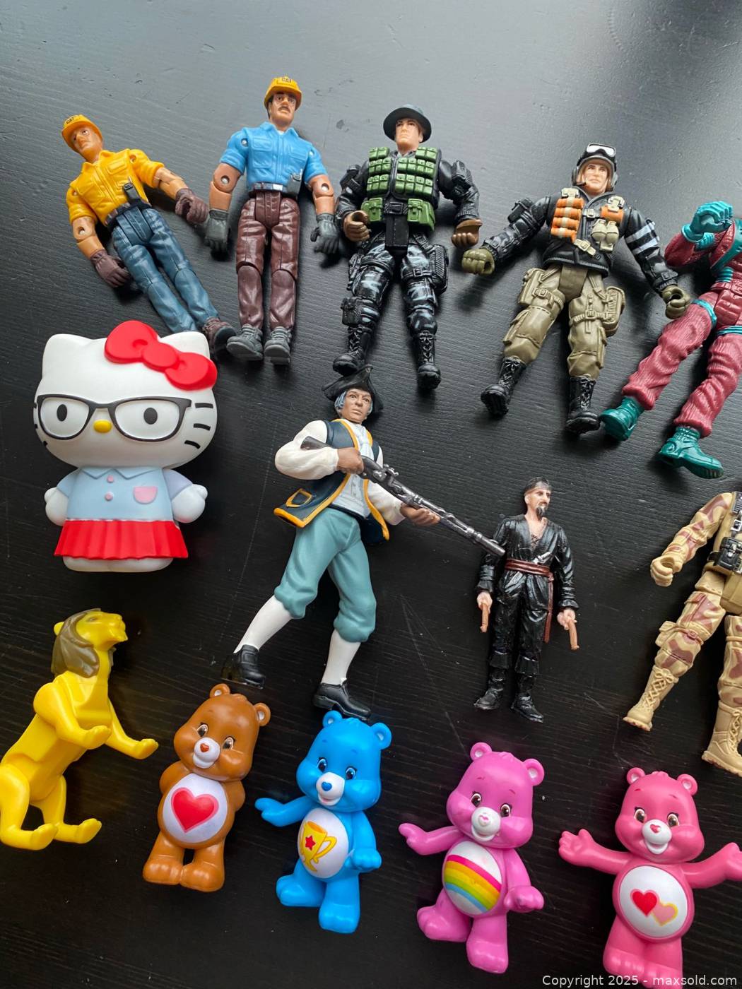 14 mixed character plastic figures | Maxsold