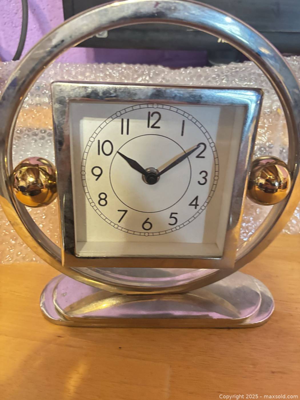 Art Deco chrome and brass-tone table clock | Maxsold