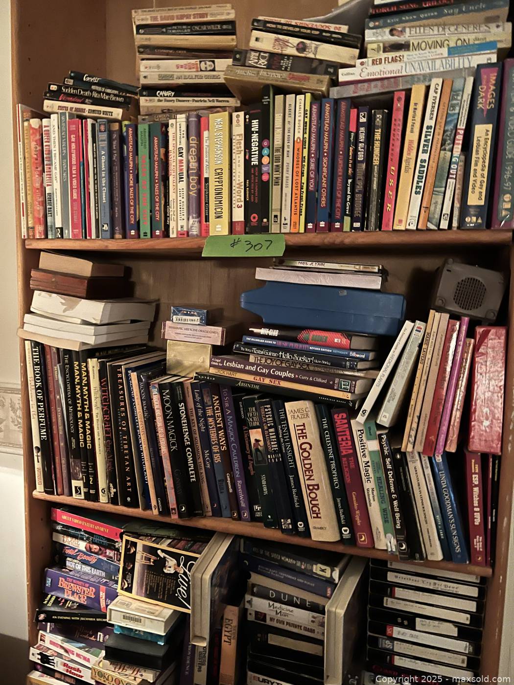 Mixed lot books, VHS tapes, cassettes, card decks, pine bookshelf | Maxsold