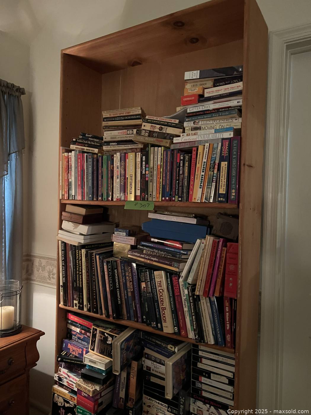 Mixed lot books, VHS tapes, cassettes, card decks, pine bookshelf | Maxsold