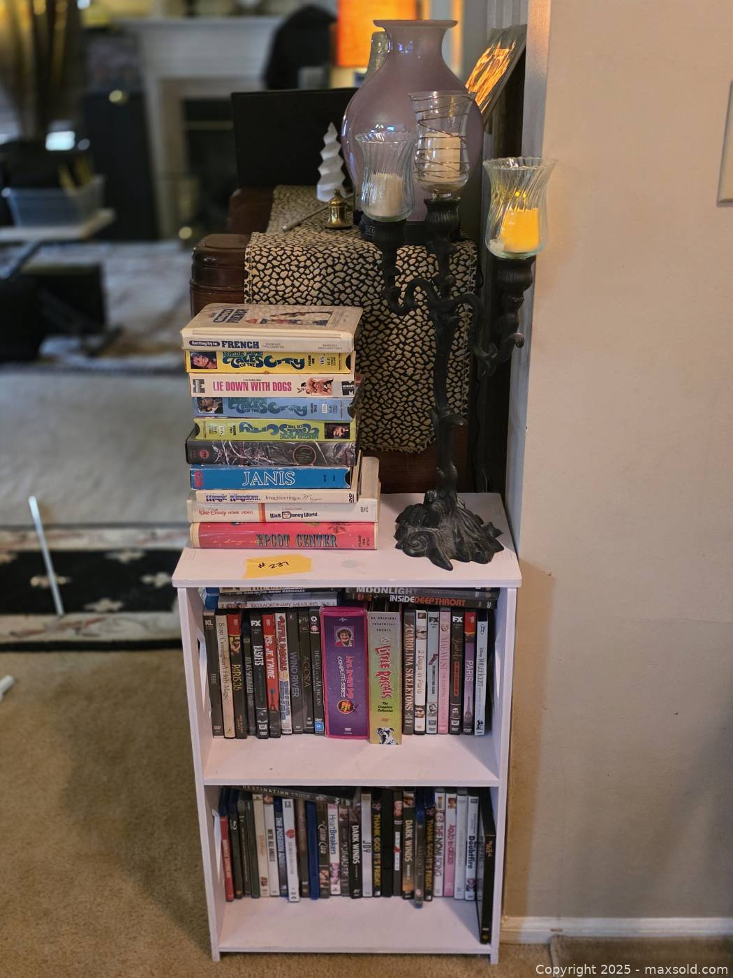 White two-shelf bookcase, approx 40 mixed VHS, DVD & Blu-ray titles ...