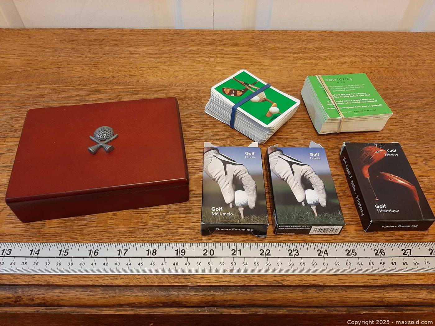 Seven golf-themed playing and trivia card decks | Maxsold