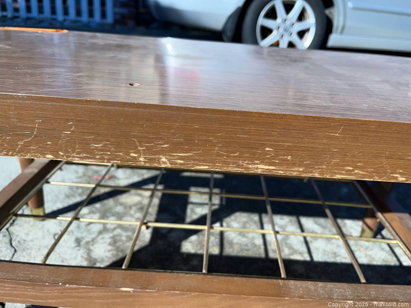 1970s coffee table with brass capped feet | Maxsold