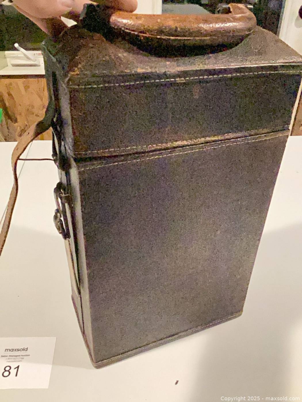 Antique metal carrying case with leather handle | Maxsold