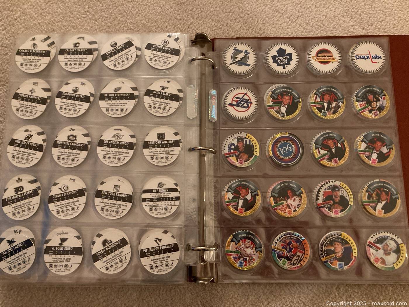 Binder of NHL pog collectibles | Maxsold