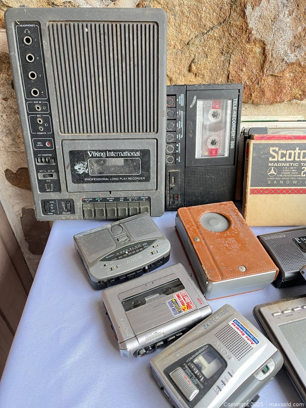 Vintage portable audio devices, tapes, remotes & camcorder | Maxsold