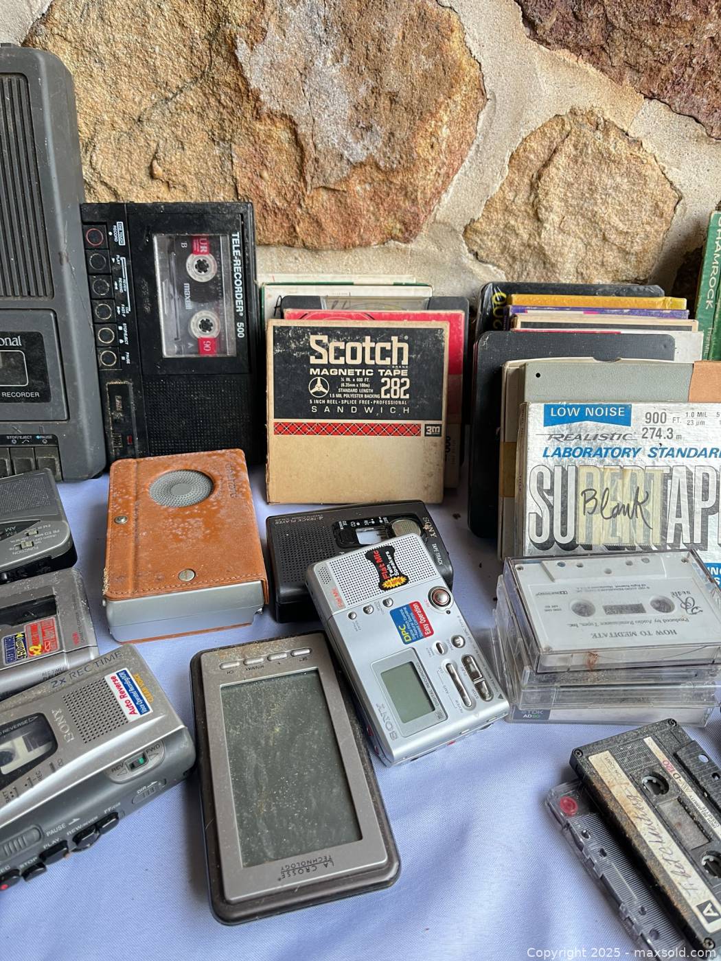 Vintage portable audio devices, tapes, remotes & camcorder | Maxsold