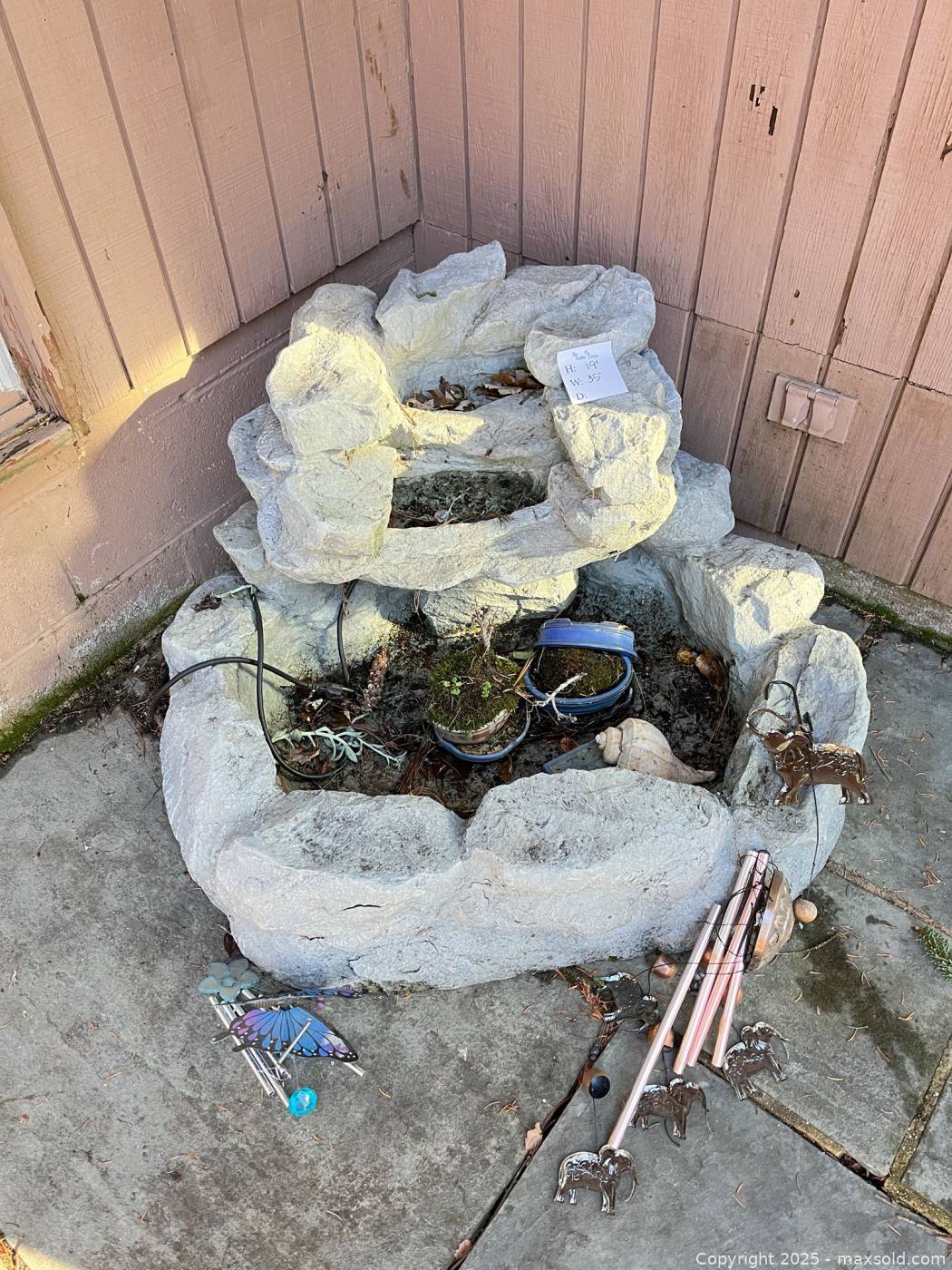Tiered cast concrete garden fountain with wind chimes and pots | Maxsold