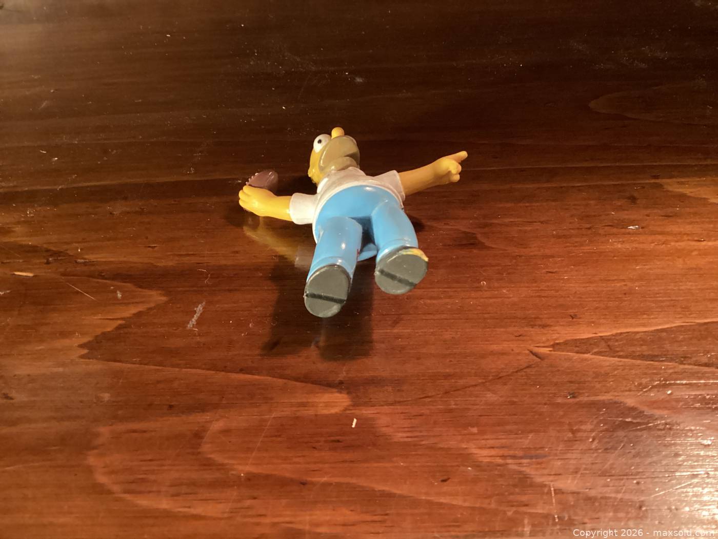 Homer Simpson football figurine | Maxsold