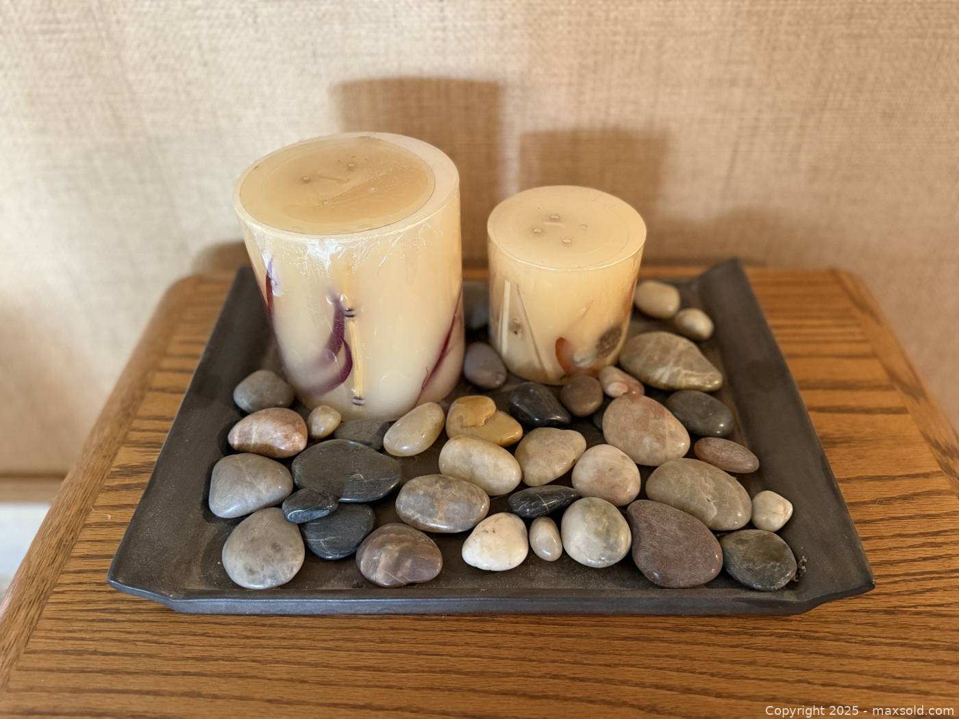 Slate tray with two pillar candles and river rocks | Maxsold