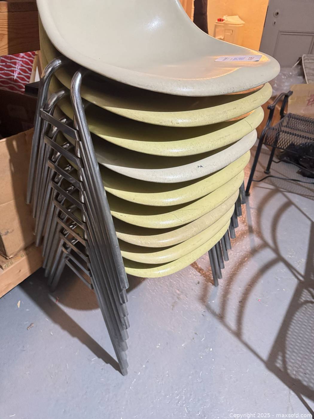 Nine stackable molded plastic chairs | Maxsold