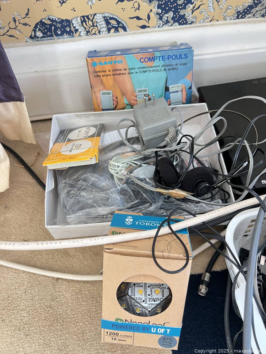 Sony DVD player, phones, Sanyo pulse meter, cables | Maxsold