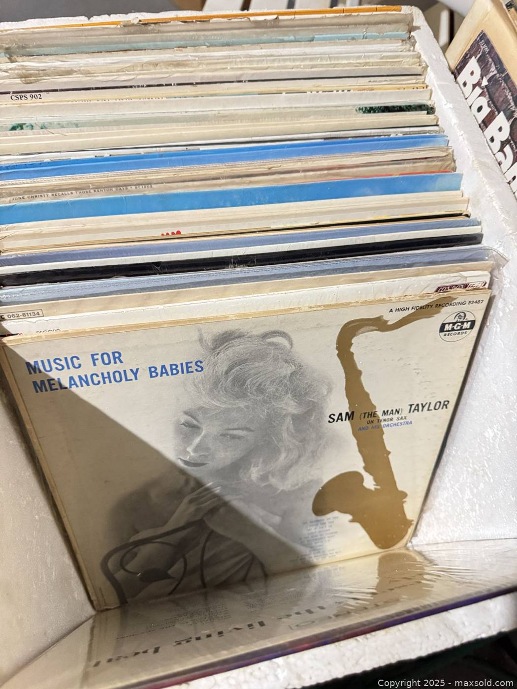 Three boxes of vinyl LP records | Maxsold