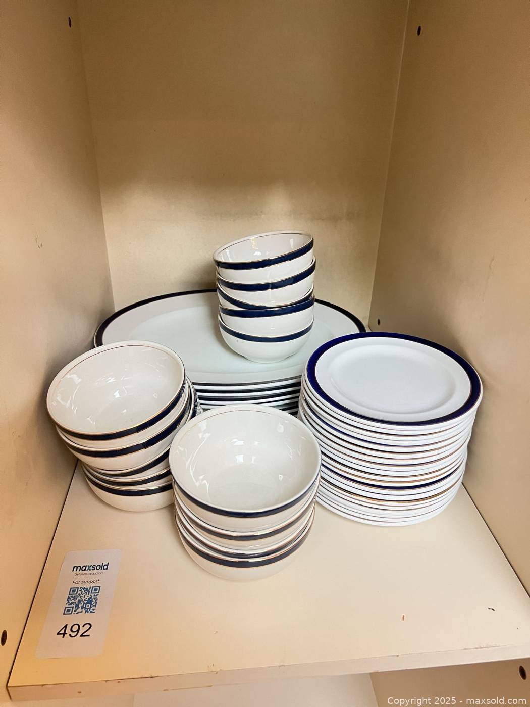 Vitrax blue-banded dinnerware and platters | Maxsold