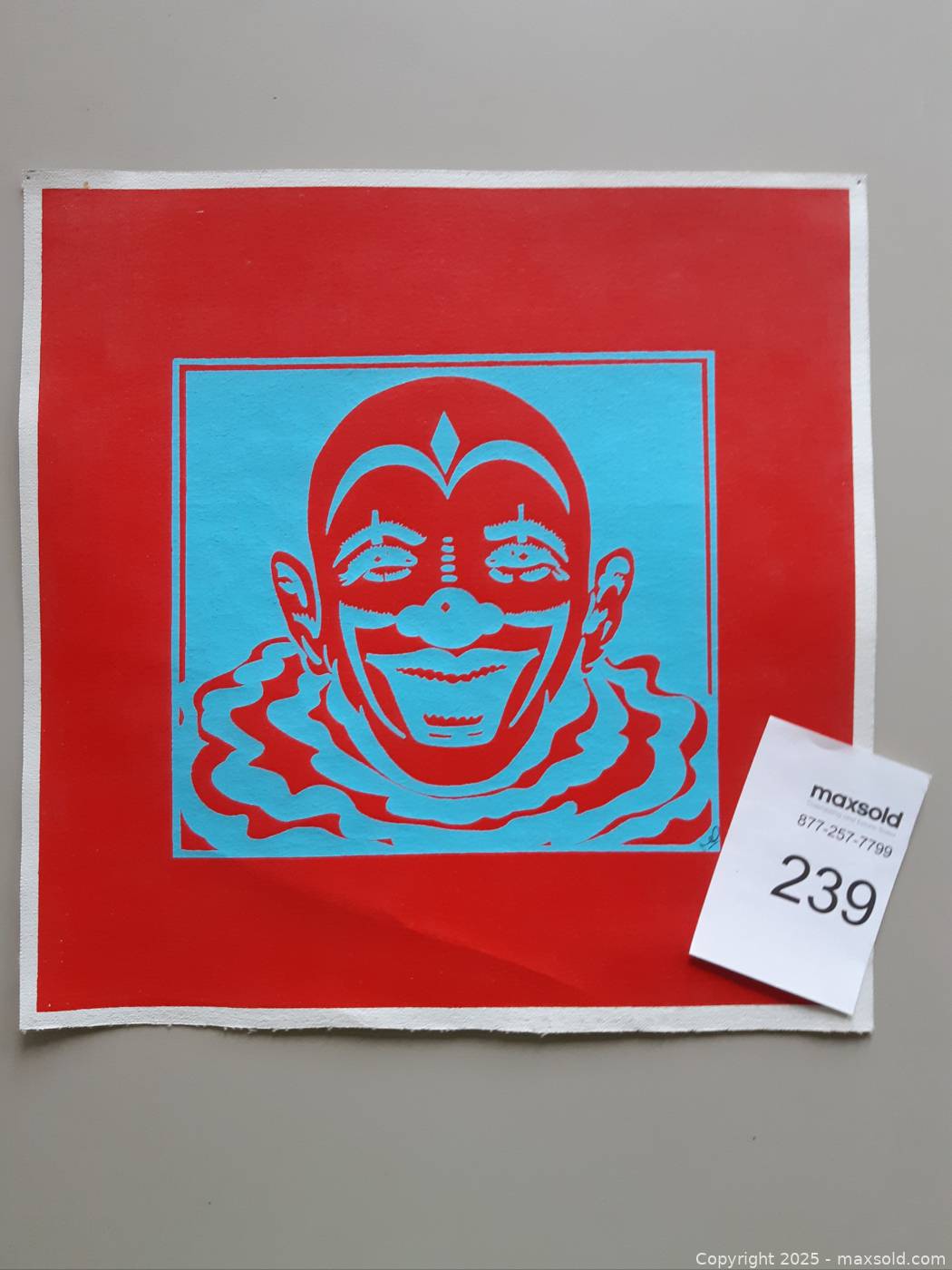 Red and blue clown print on linen | Maxsold