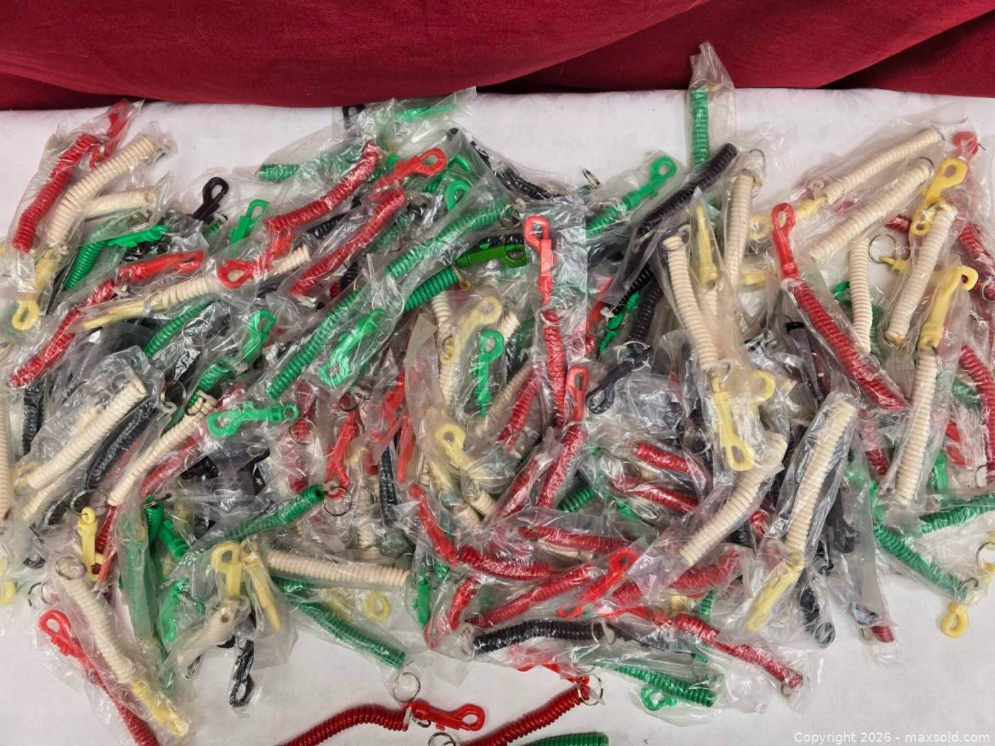 Bulk plastic spiral wrist coil keychains | Maxsold