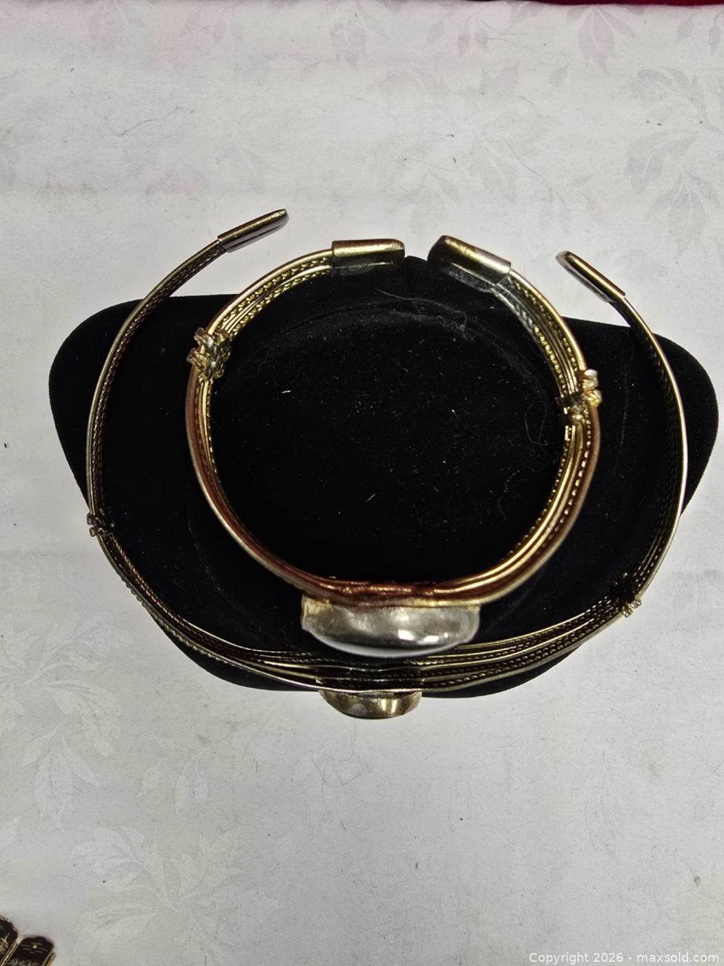 Gold-tone choker necklace and cuff bracelet with black cabochons | Maxsold