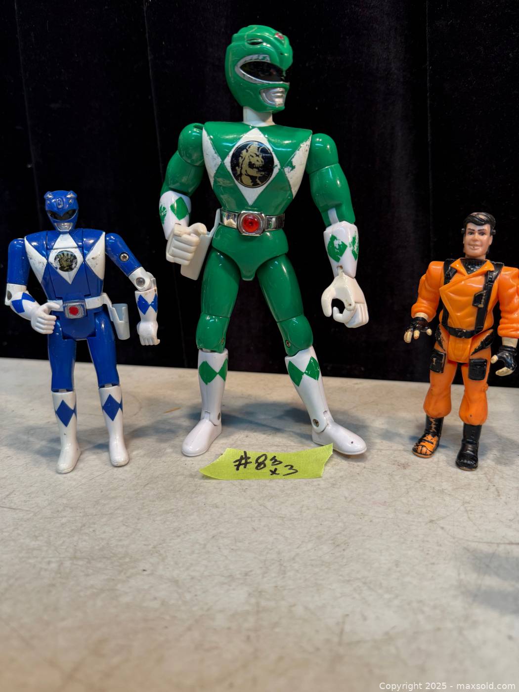 3 Power Ranger & James Bond action figures | Maxsold