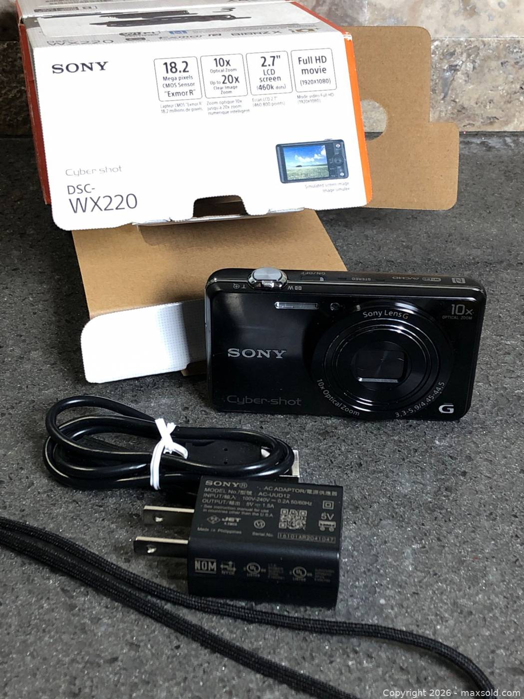 Sony Cyber-shot DSC-WX220 digital camera with charger and box | Maxsold