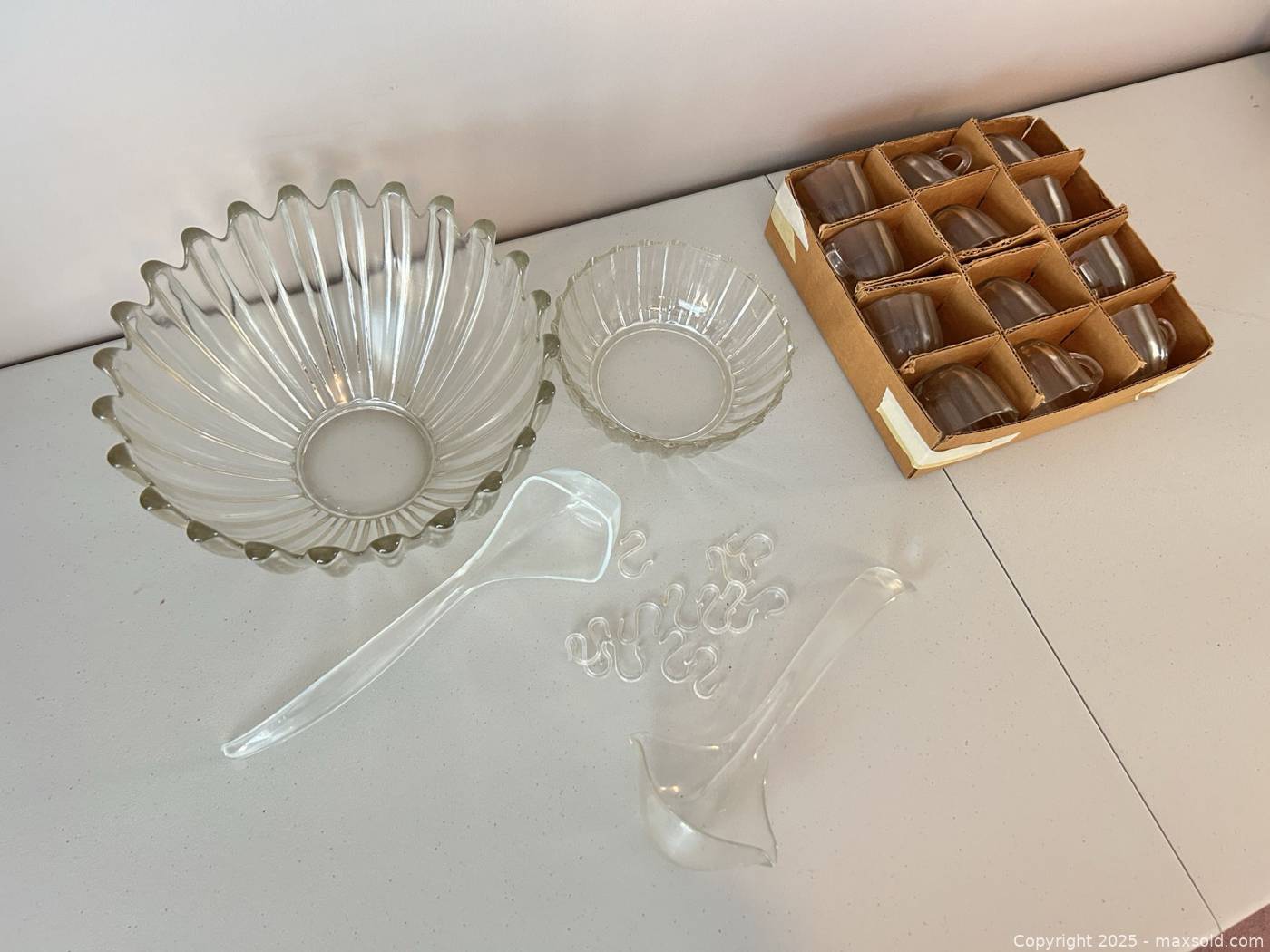 Clear glass punch bowl set with cups, hooks, ladles | Maxsold
