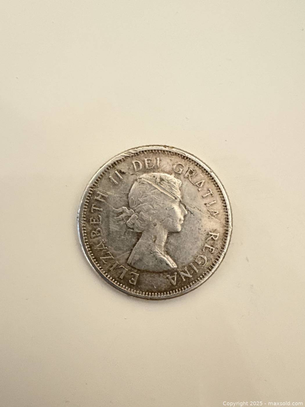 1964 Canadian silver quarter | Maxsold