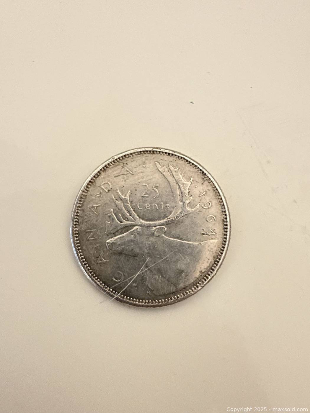 1964 Canadian silver quarter | Maxsold