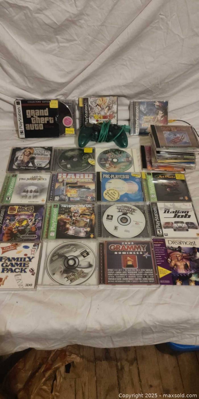 PlayStation PS1 Game Discs and Controllers | Maxsold