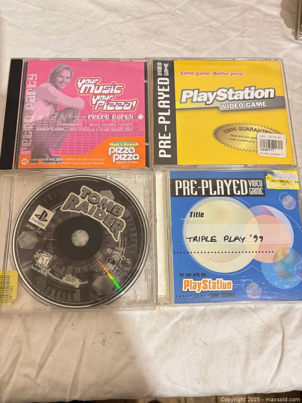 PlayStation PS1 Game Discs and Controllers | Maxsold