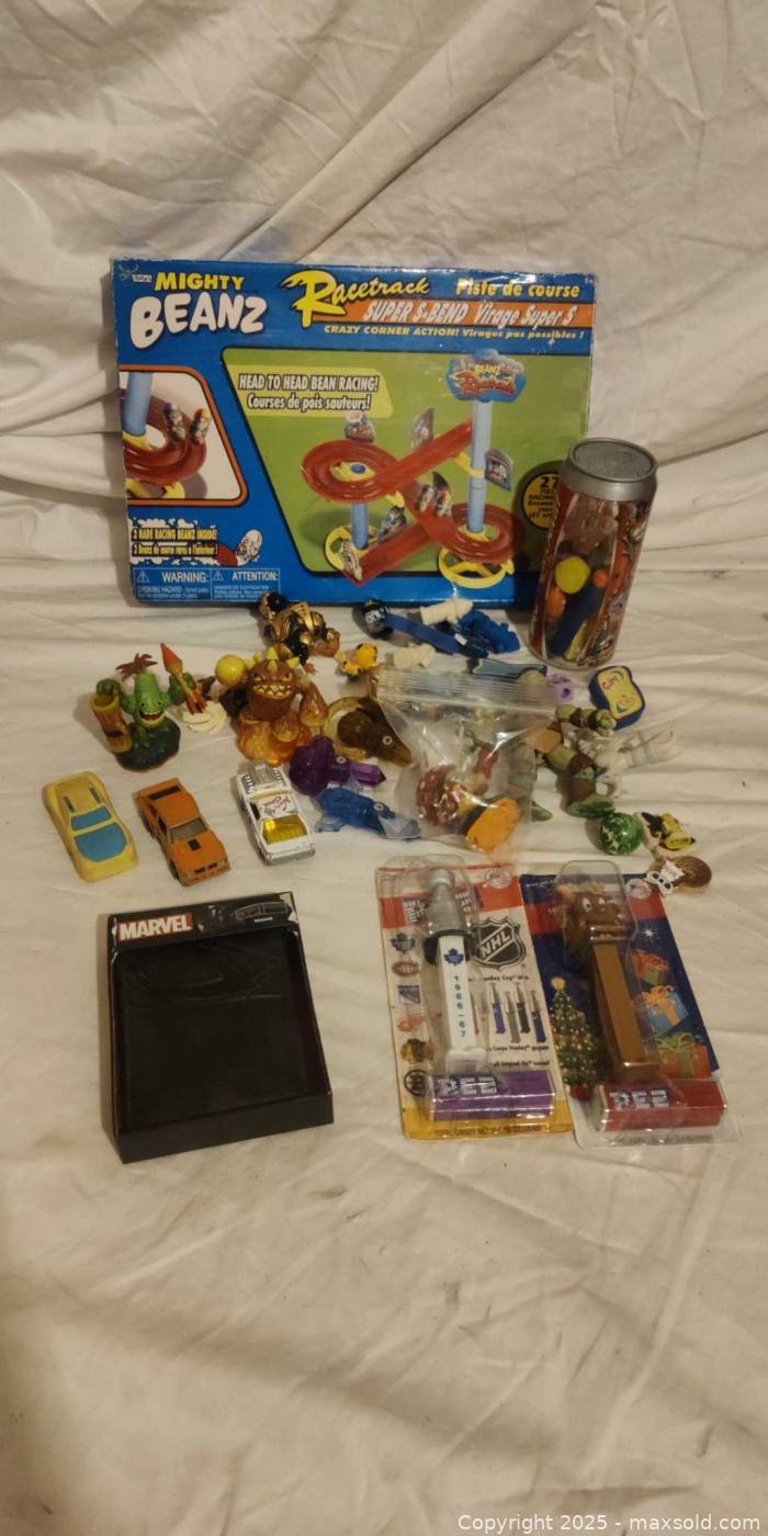 Mixed Lot Mighty Beanz Racetrack, PEZ, Cars, Figures | Maxsold