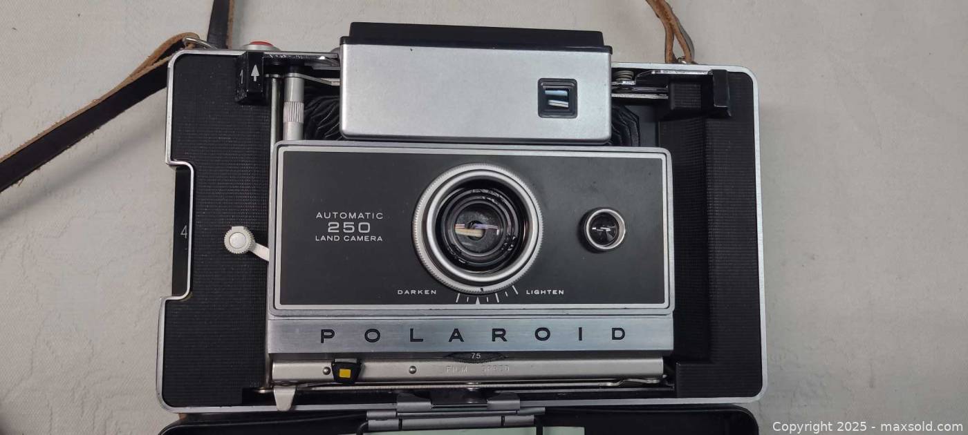 Polaroid Automatic 250 Land Camera & Bushnell 10x50 Binoculars | Maxsold